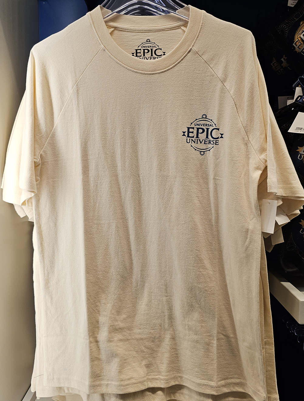 Universal Studios Epic Universe Logo Ivory Epic Emblem T-Shirt ...